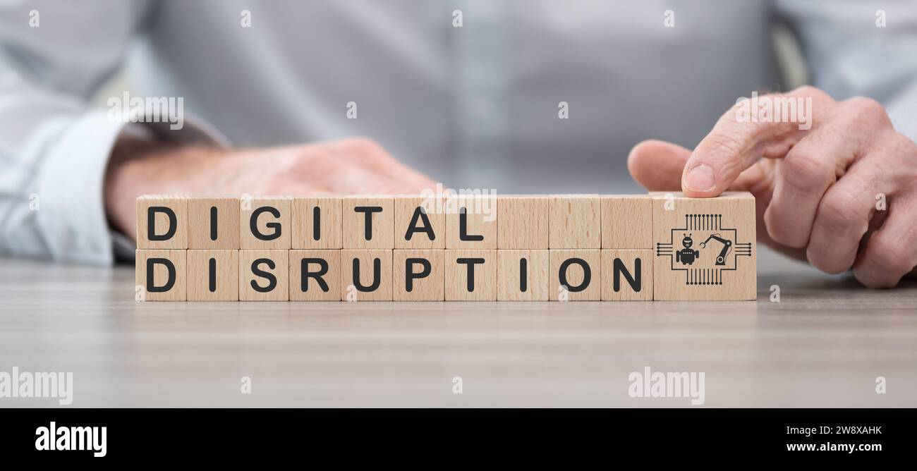 Wooden blocks with symbol of digital disruption concept Stock Photo - Alamy