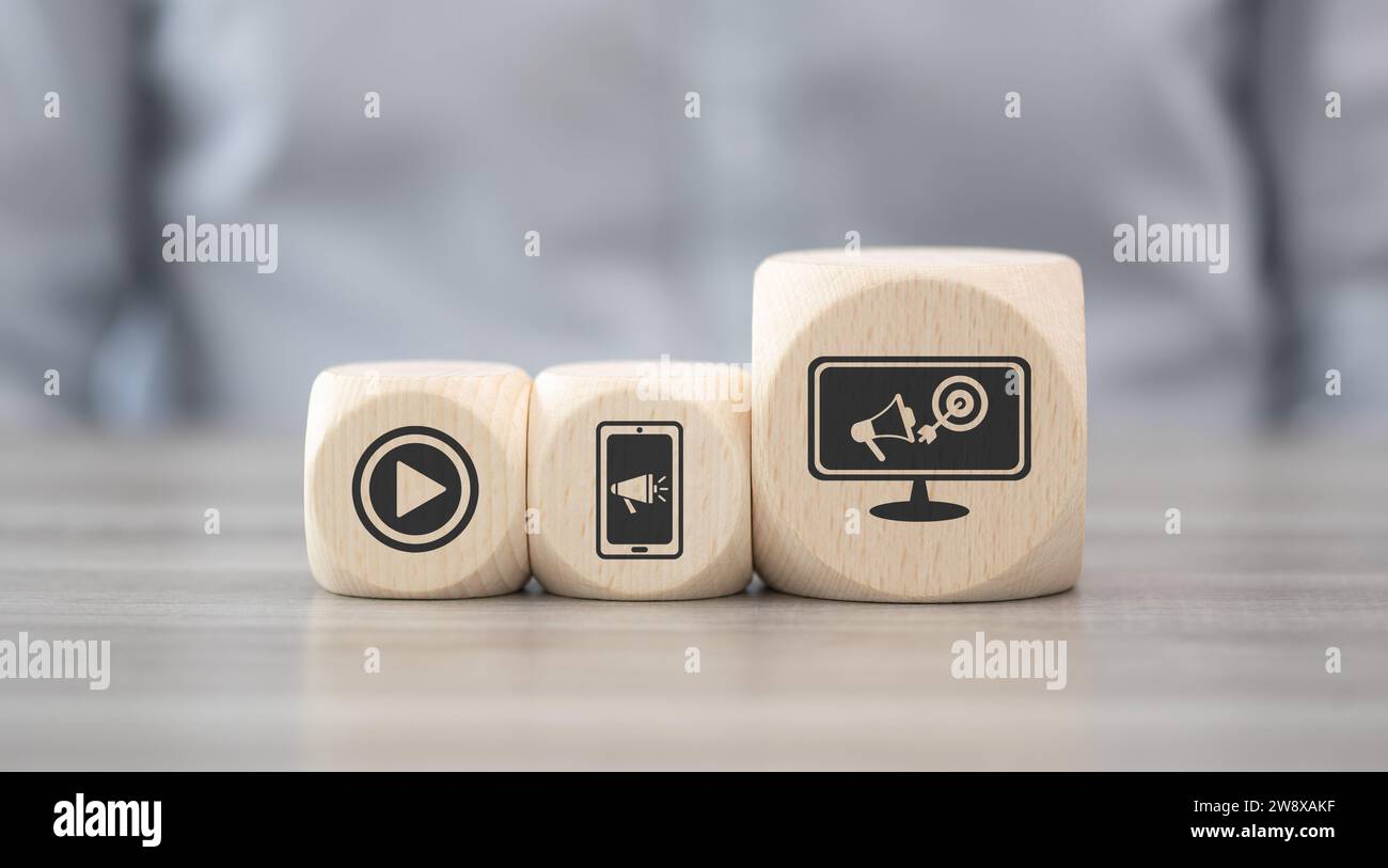 Wooden blocks with symbol of ad targeting concept Stock Photo - Alamy