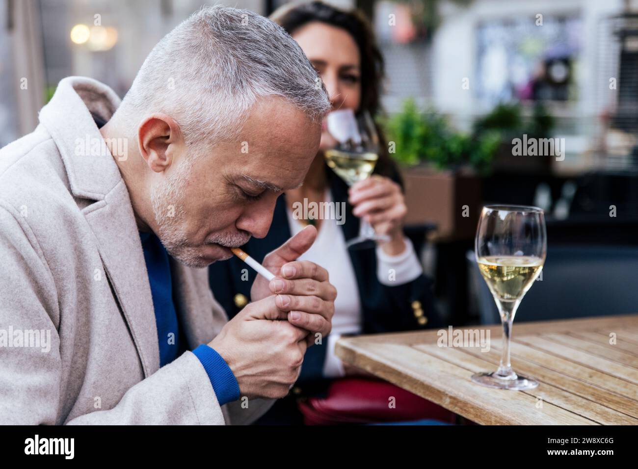 Elder man drinking wine smoking hi-res stock photography and images - Alamy