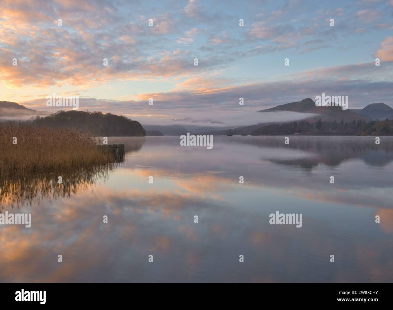 A hazy but beautiful dawn looking down the length of Derwentwater ...