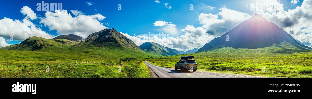 Panorama of Glen Etive and SUV BMW X3 with a roof tent, The Buachaille ...