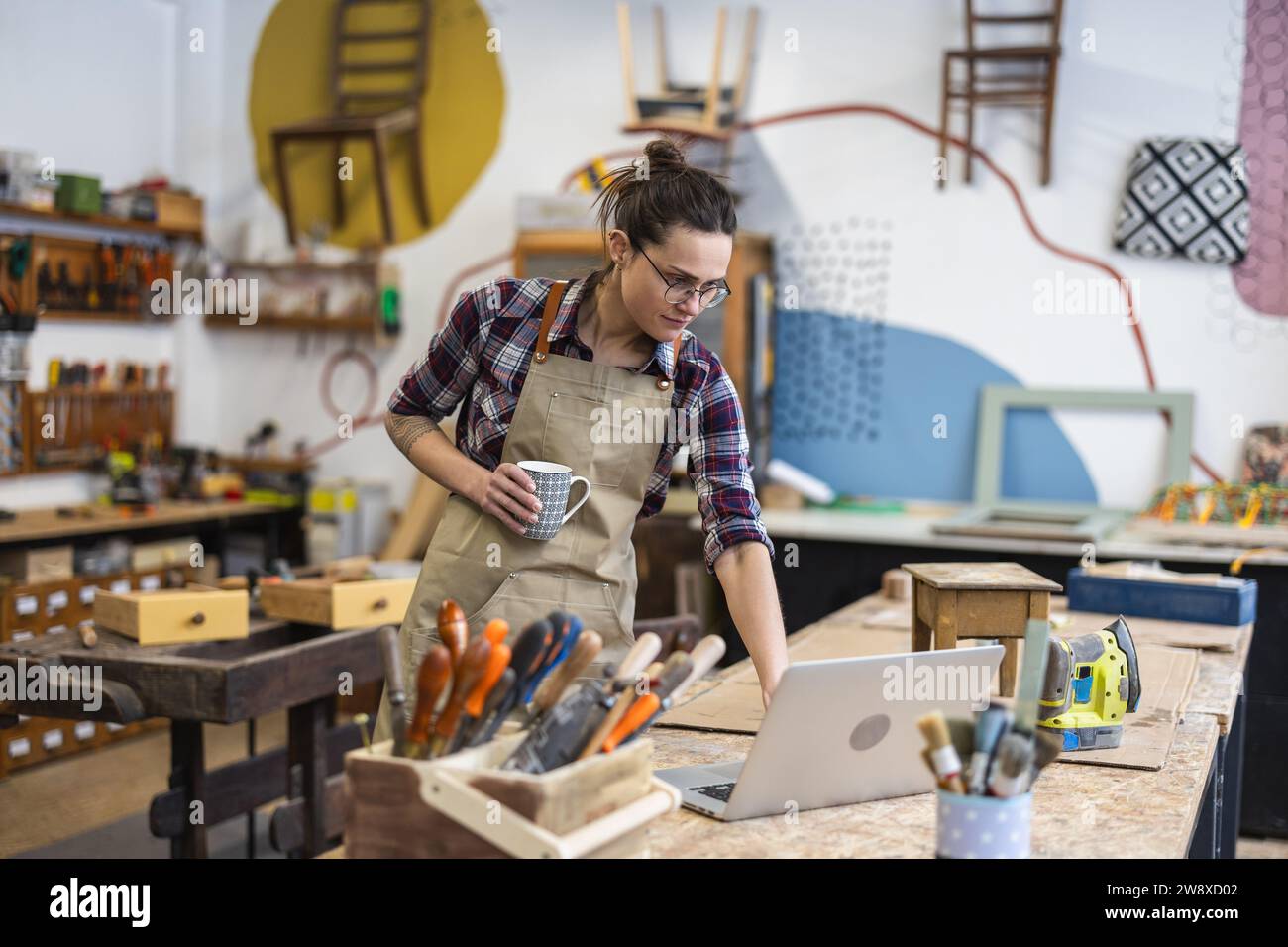 Female carpenter chair hi-res stock photography and images - Alamy