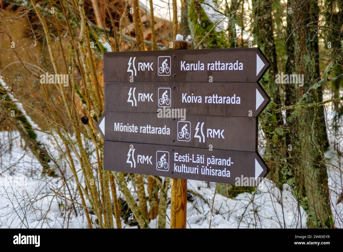 Hand-made wooden sign with directions RMK Estonian-Latvian border ...