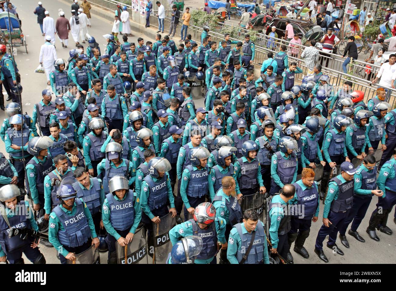 Bangladeshi police with shields and helmets stands guard On December 22,2023, Dhaka,Bangladesh ...