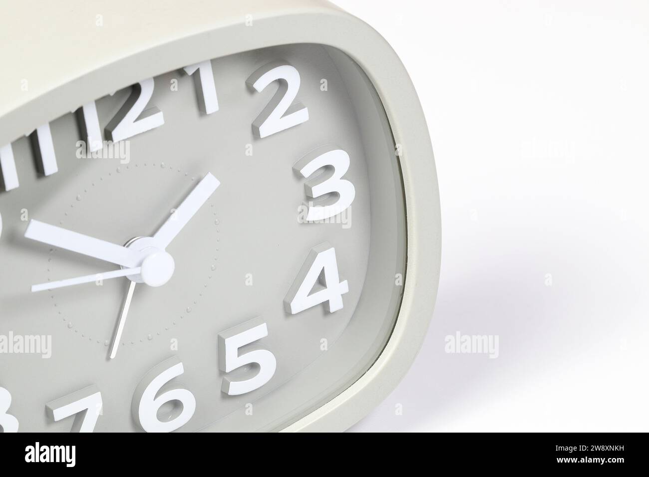 Cheap gray quartz alarm clock isolated on white background Stock Photo ...