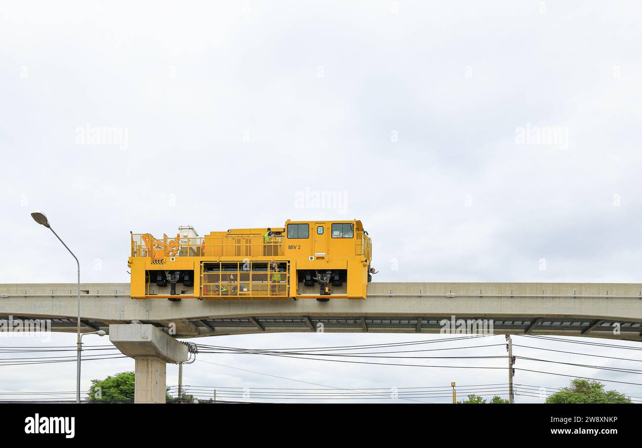 The Modern Yellow rails maintaining machine car stand by for making ...