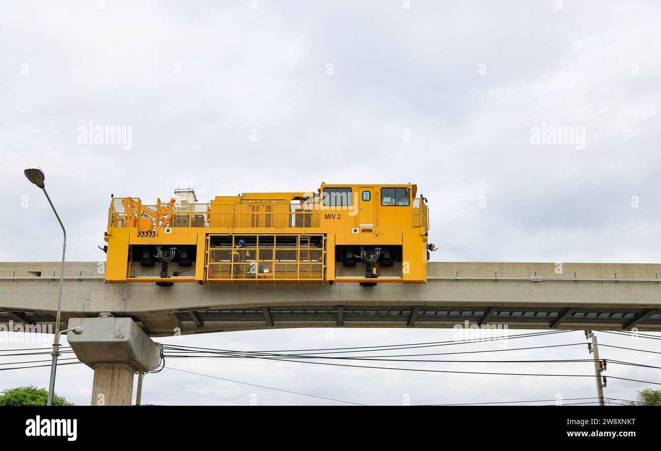 The Modern Yellow rails maintaining machine car stand by for making ...