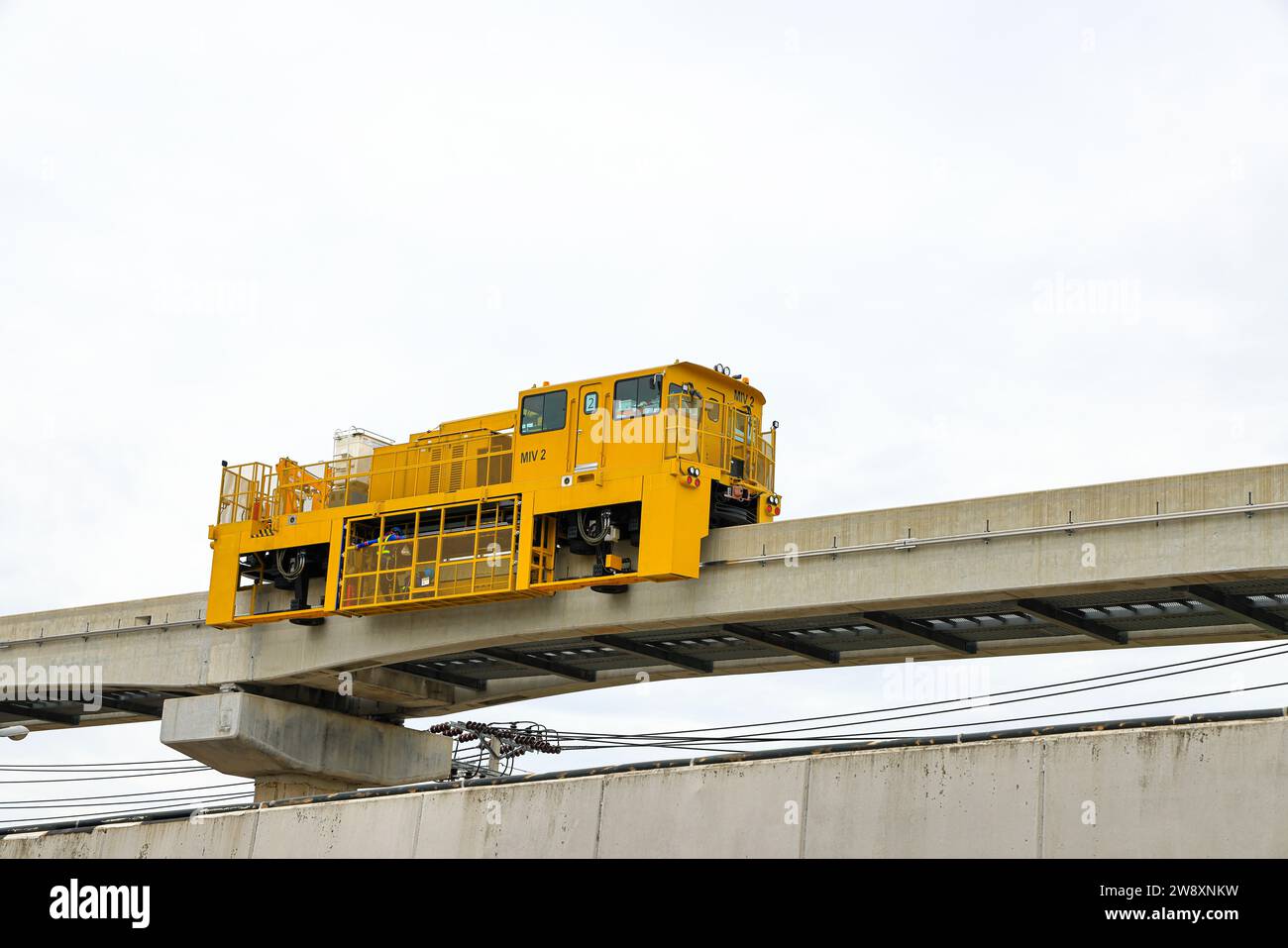 The Modern Yellow rails maintaining machine car stand by for making ...
