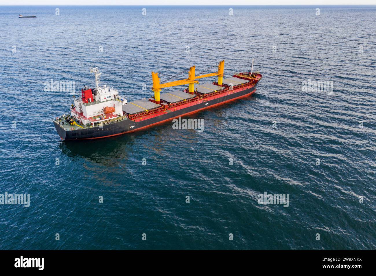 Large ship at sea. Aerial top view of cargo ship vessel import export ...
