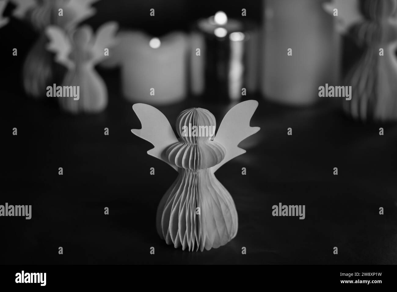 DIY paper angel on a dark background. Religious symbols, festive ...