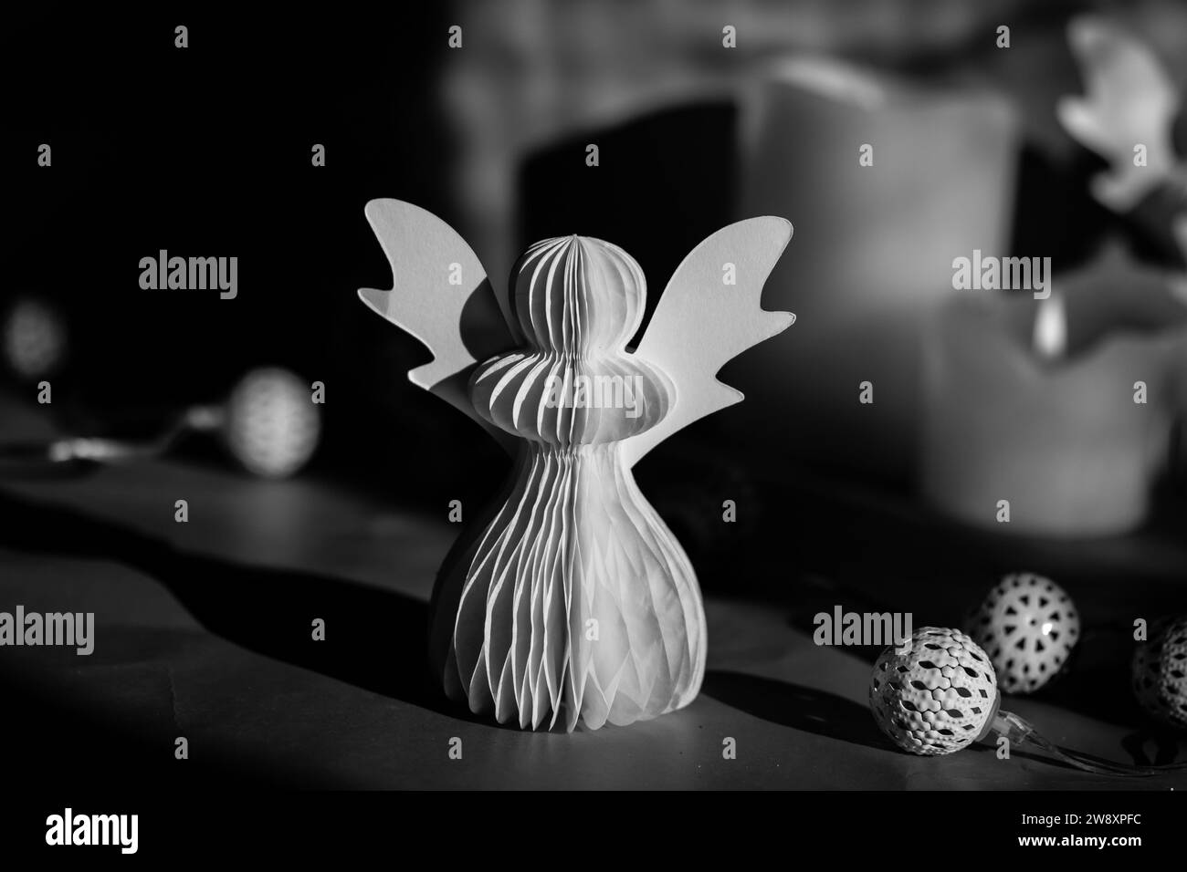DIY paper angel on a dark background. Religious symbols, festive ...