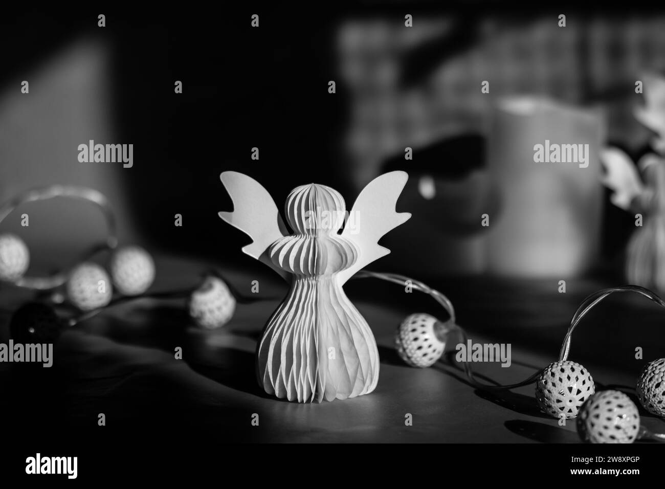 DIY paper angel on a dark background. Religious symbols, festive ...