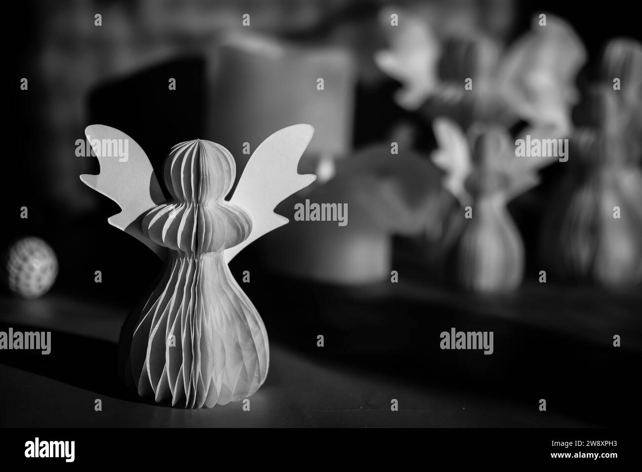 DIY paper angel on a dark background. Religious symbols, festive ...