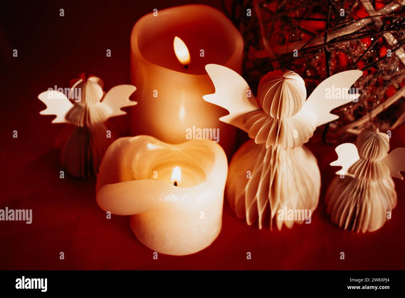 DIY paper angels. Hand made angel on red background. New Year creative ...