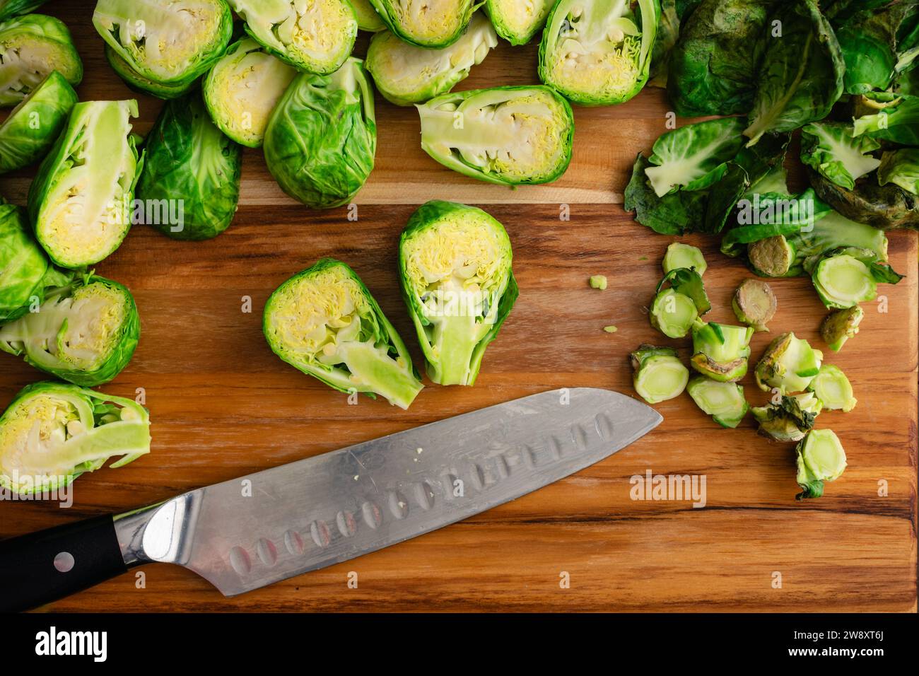 Halved Brussels Sprout Viewed Close Up on a Wood Cutting Board: Fresh ...