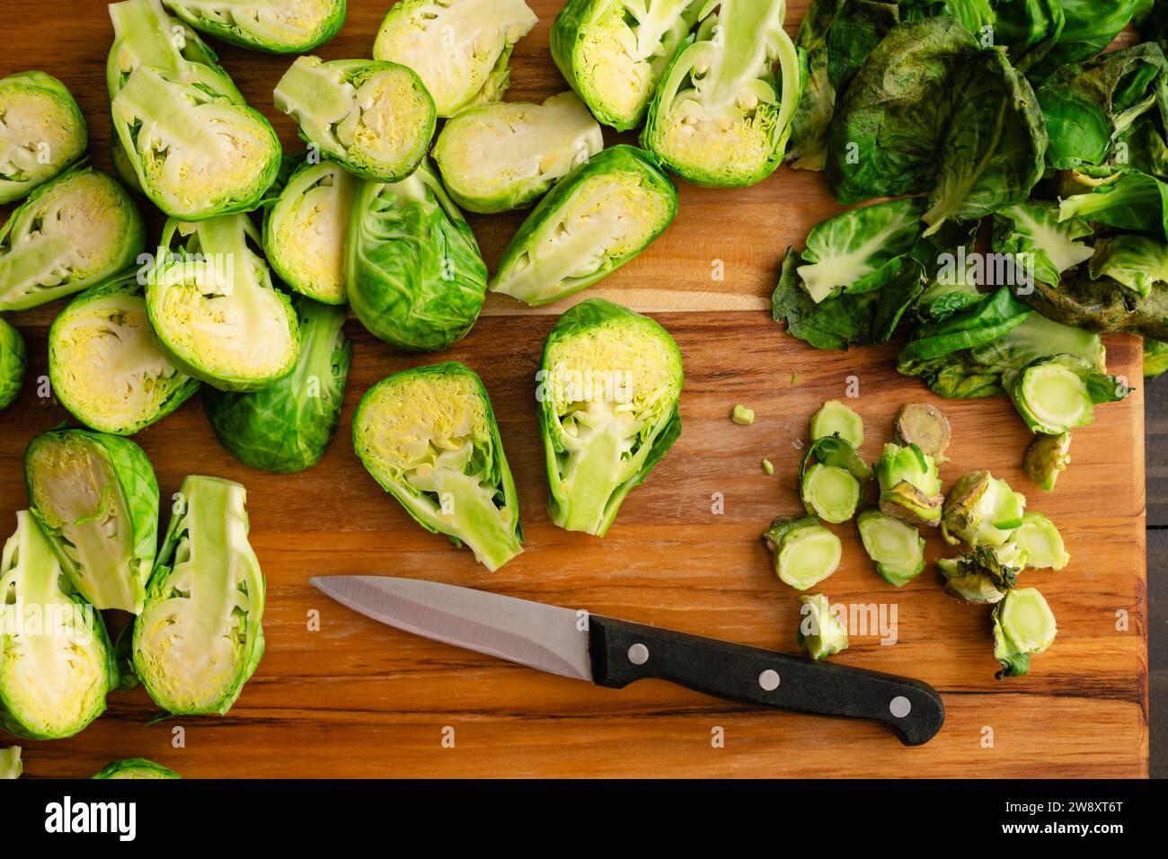 Halved Brussels Sprout Viewed Close Up on a Wood Cutting Board: Fresh ...