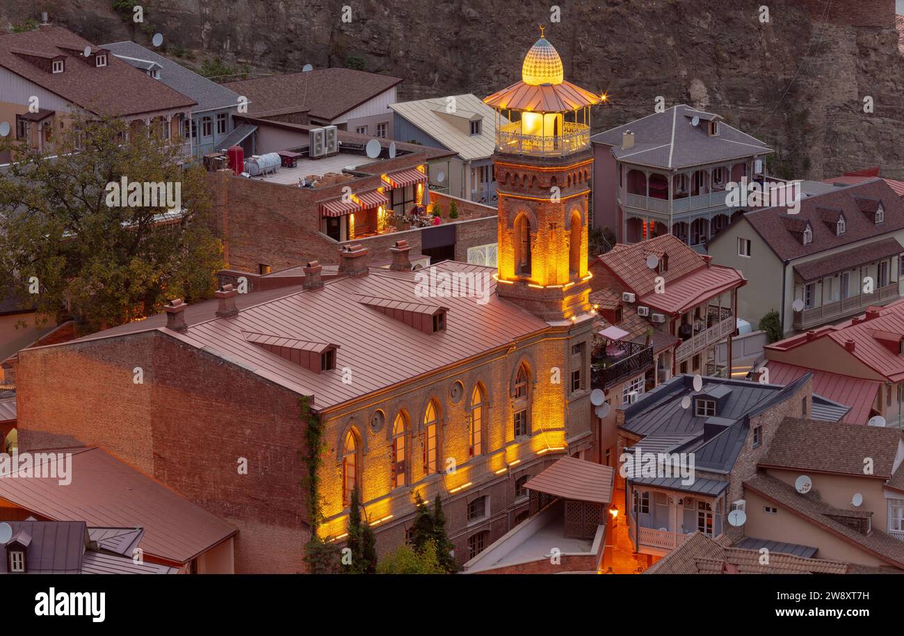 View of the old Ottoman mosque with minaret in the night illumination ...