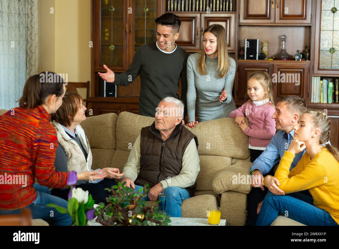 Big family together at home Stock Photo - Alamy