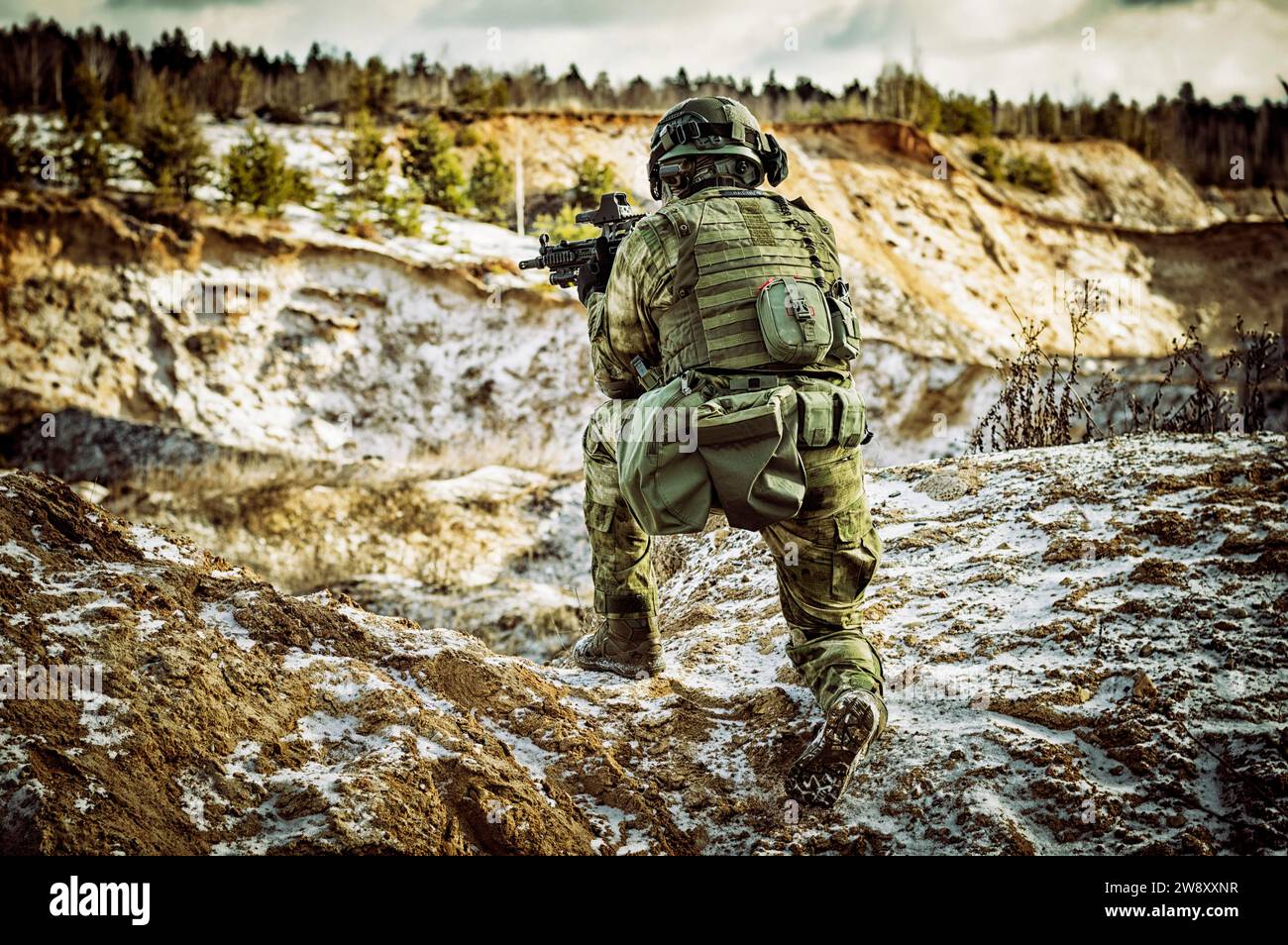 The fighter of a special unit performs a dangerous mission. Mixed media ...