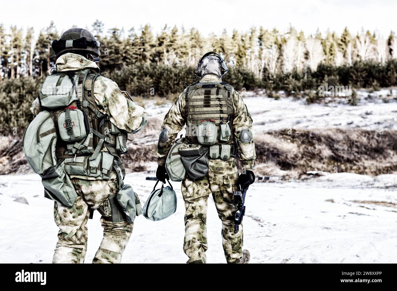 Two soldiers of a special unit are preparing to carry out a dangerous ...