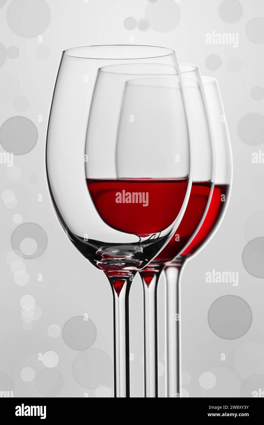 A composition of three wine glasses isolated Stock Photo - Alamy