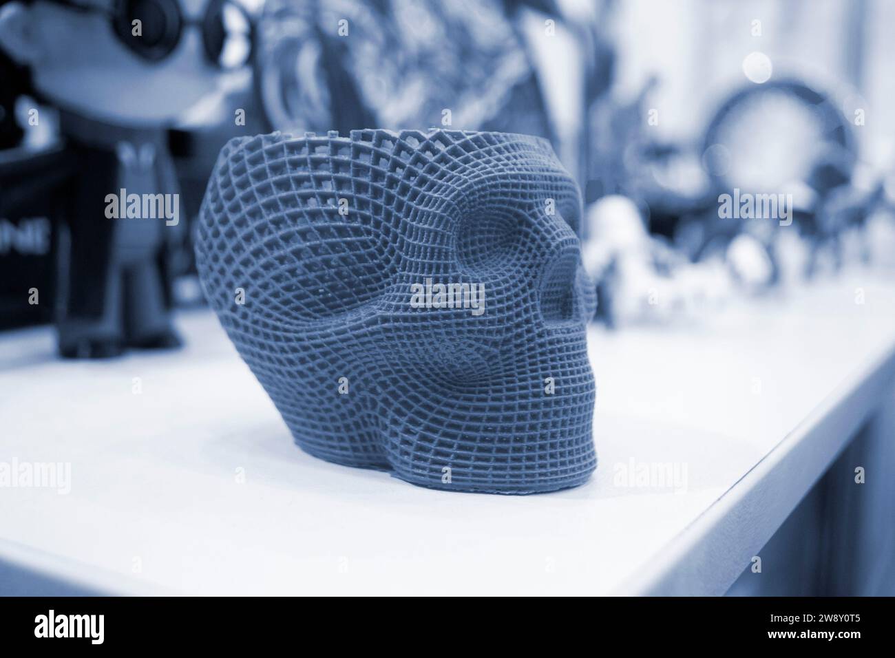 Prototype of human skull printed on 3D printer from molten purple ...