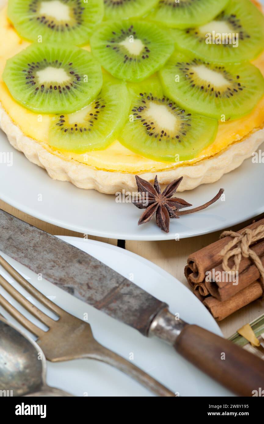 Kiwi pie tart with lemon custard cream and spices, food photography ...