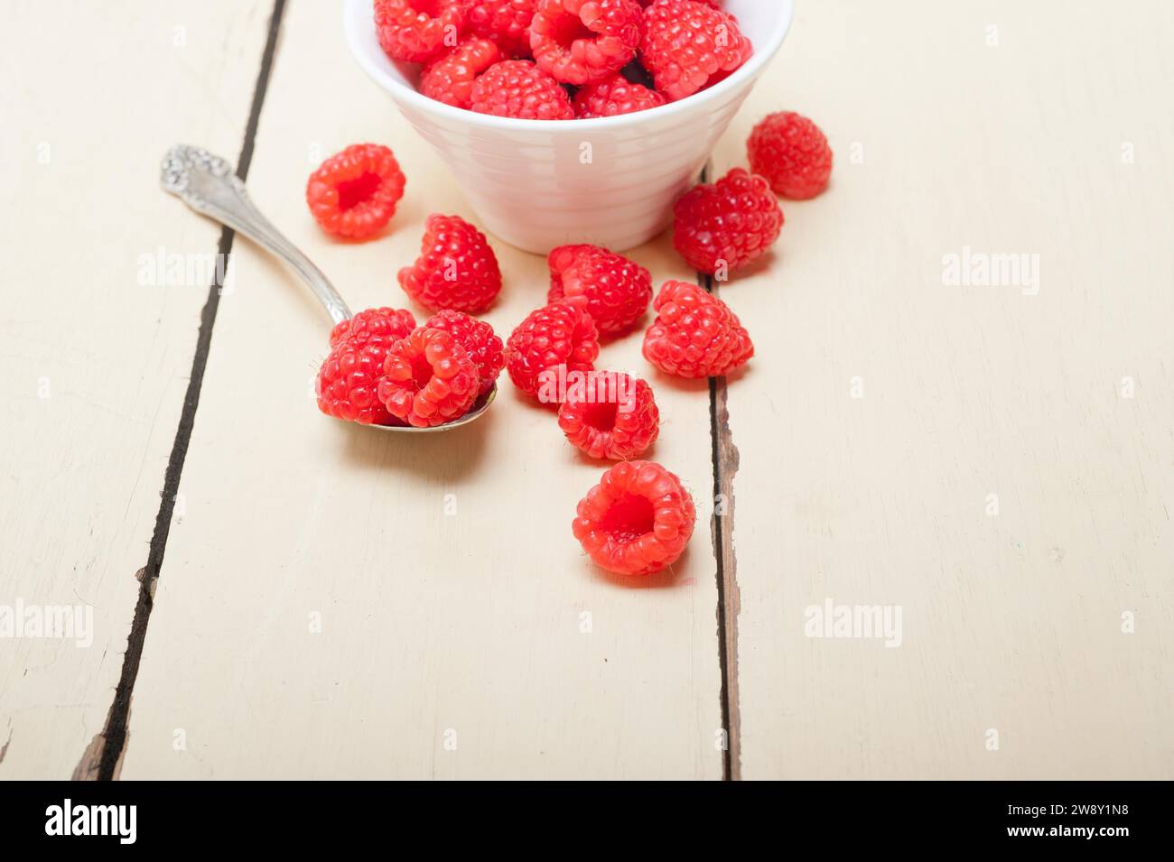Bunch of fresh raspberry on a bowl and white wood rustic table, Food ...