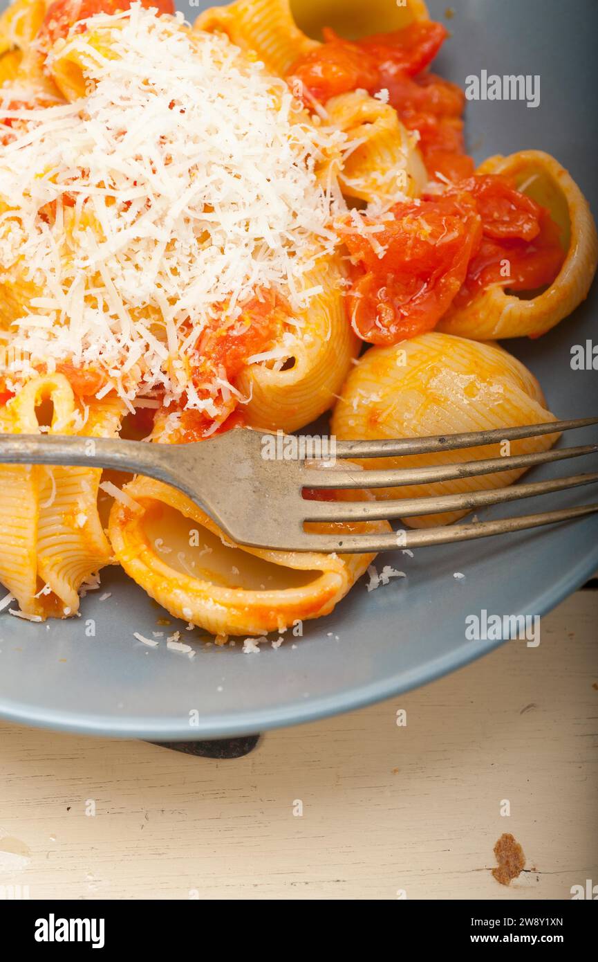 Italian snail lumaconi pasta with ripe cherry tomatoes sauce ...