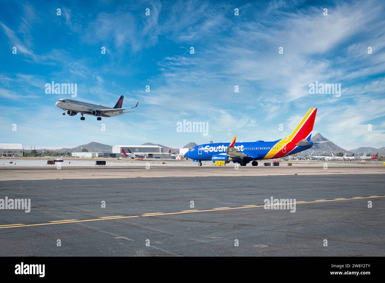 Southwest Boeing 737 awaits clearance onto the active runway at Tucson ...