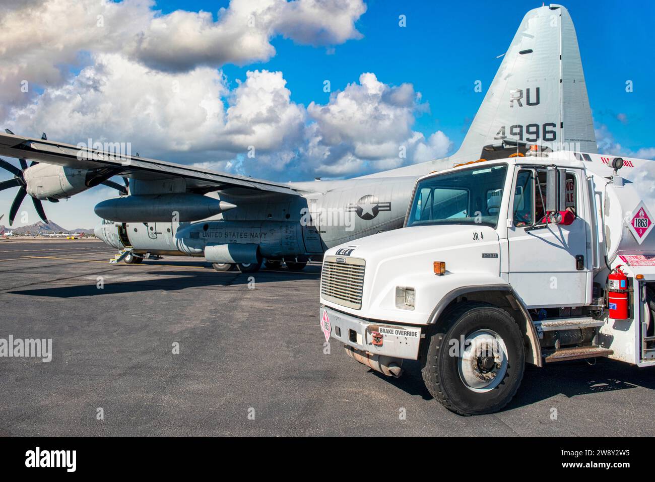 C130 of the US NAVY being refueled at Tucson International Airport in ...