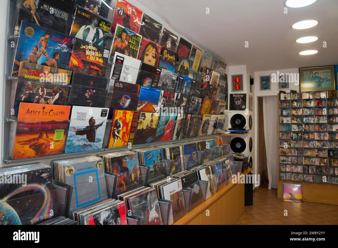 Interior view of a music shop with a wide selection of vinyl records ...