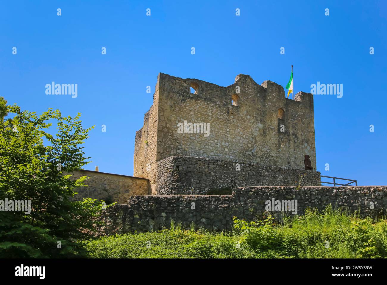 Castle Derneck, medieval castle ruin, masonry, stone, flag, blue sky ...