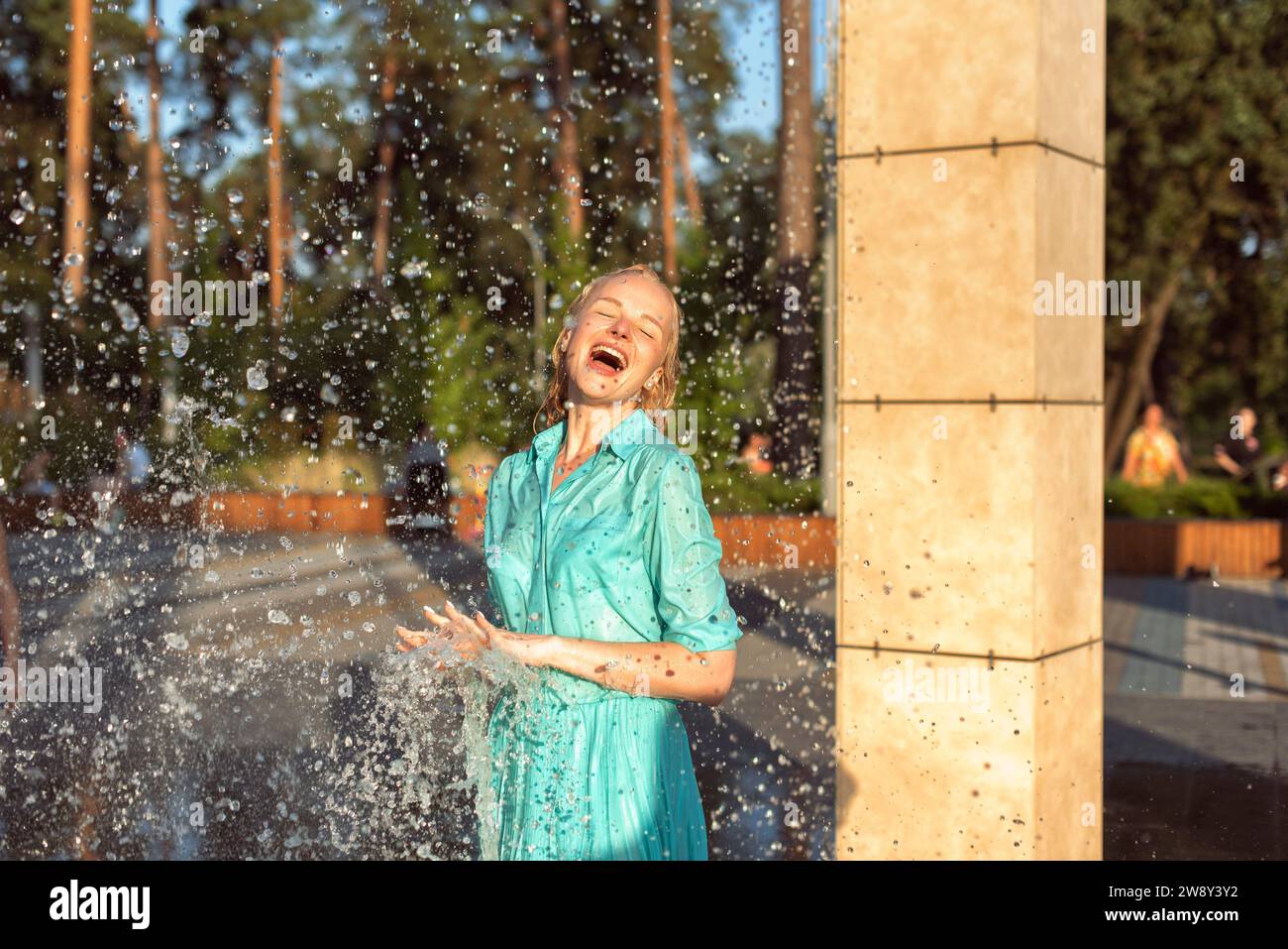 Woman wet clothes in fountain hi-res stock photography and images - Alamy