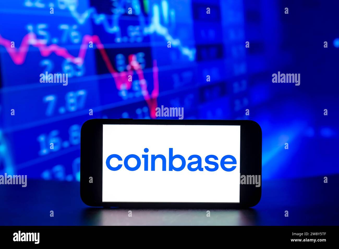 In this photo illustration, the coinbase logo seen displayed on a ...