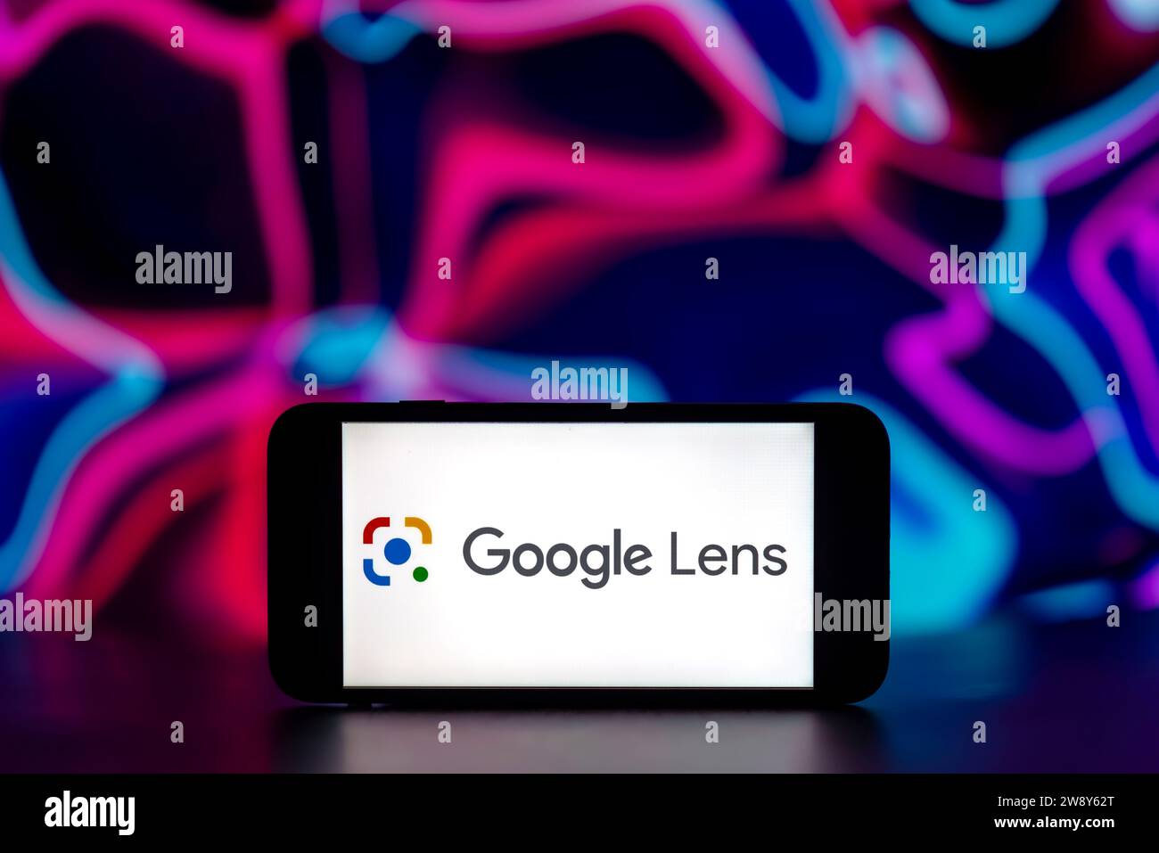 In this photo illustration, the Google lens logo is seen displayed on a ...
