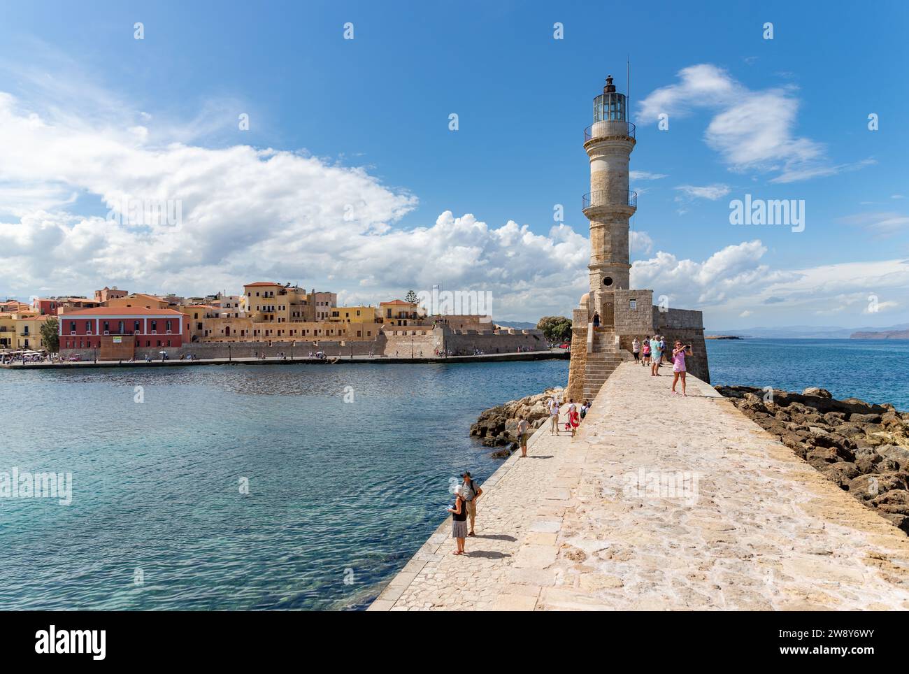 A picture of the Lighthouse of Chania, on the right, and the Firka ...