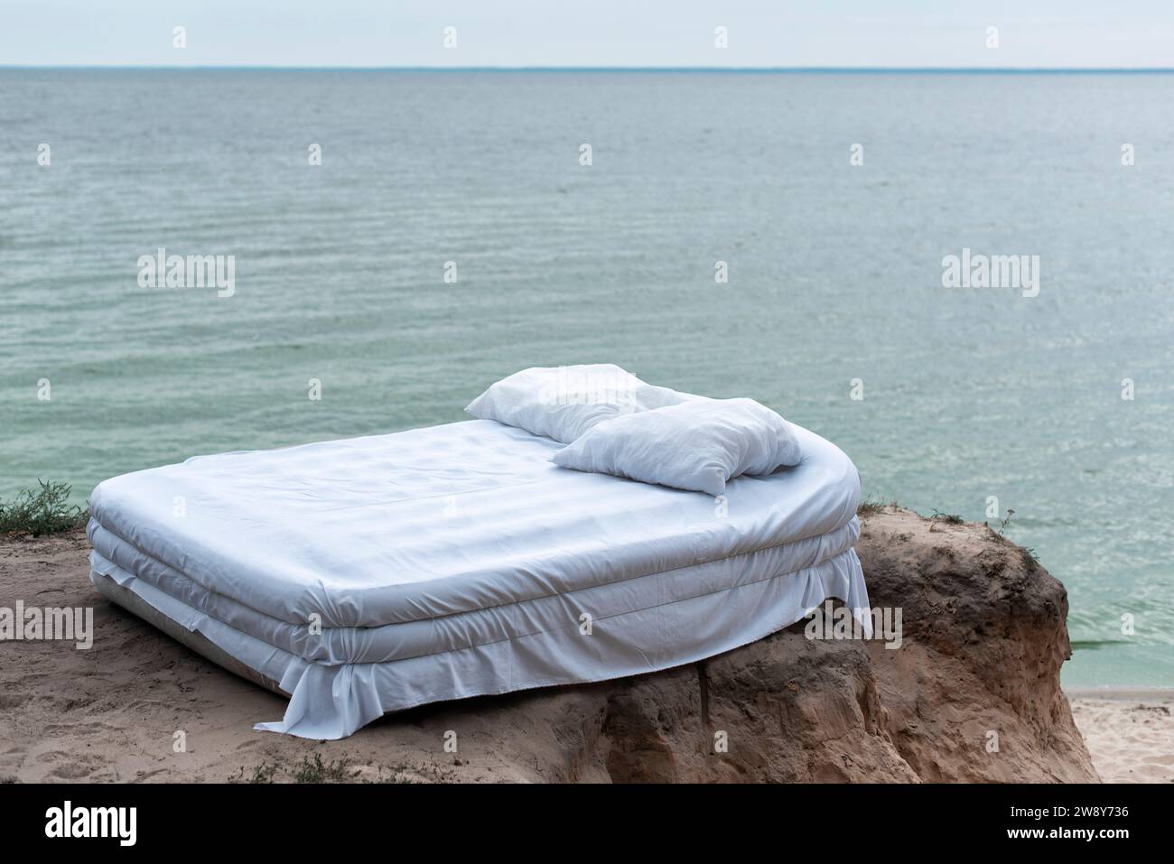 Large bed on the beach near the sea Stock Photo - Alamy