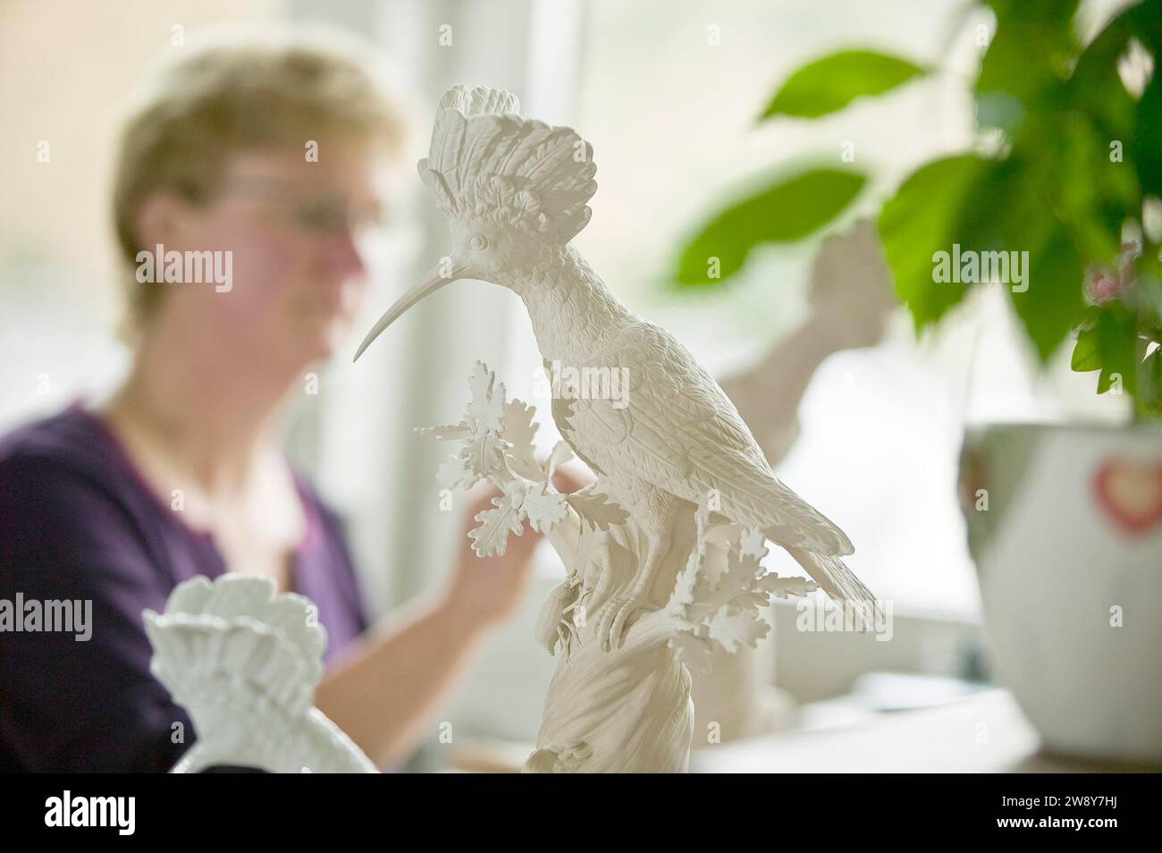 Embossing of porcelain parts Stock Photo - Alamy