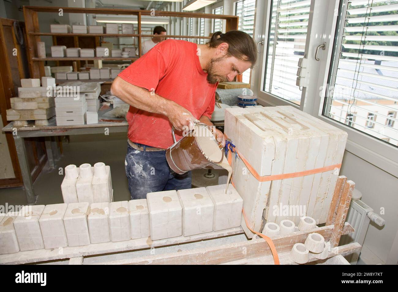 Casting porcelain paste Stock Photo - Alamy