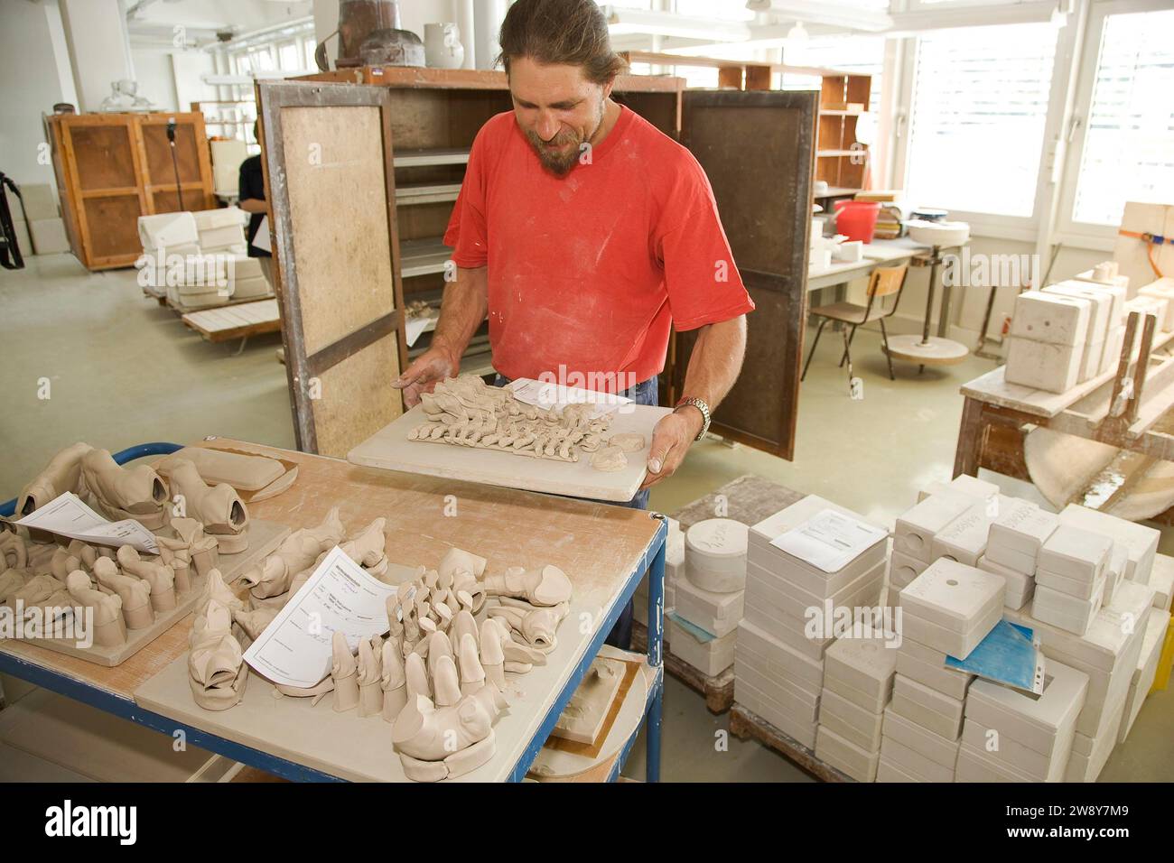 Casting porcelain paste Stock Photo - Alamy