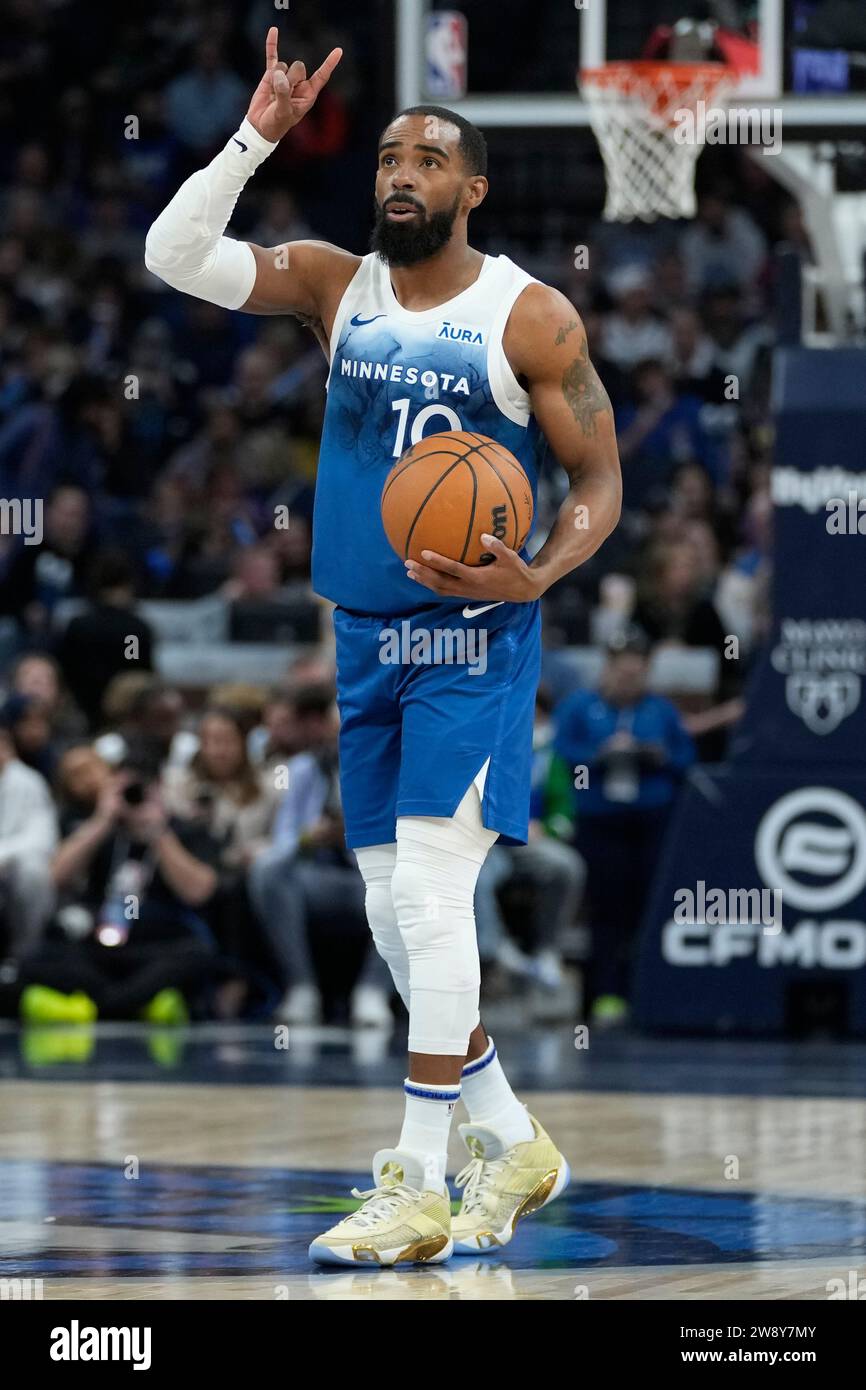 Minnesota Timberwolves guard Mike Conley (10) signals while bringing ...