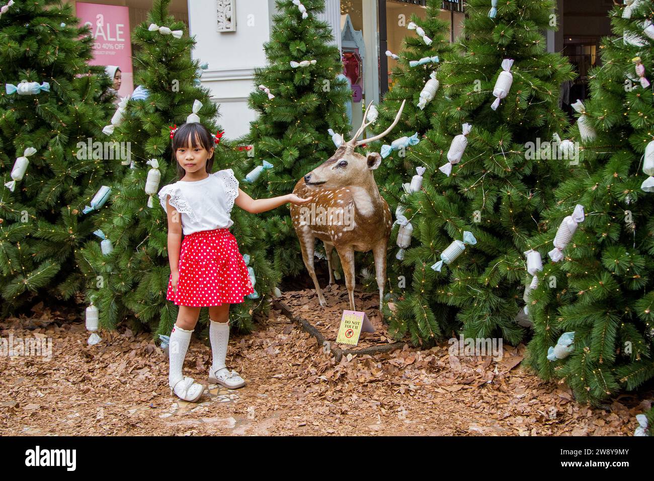 Bandung, West Java, Indonesia. 22nd Dec, 2023. A children poses for ...