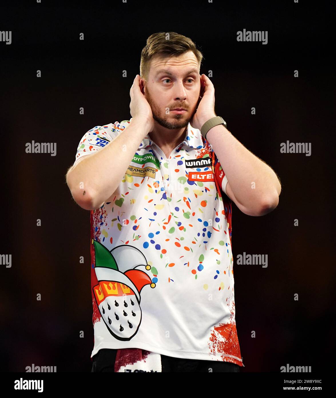 Florian Hempel reacts after winning his match against Dimitri Van den ...