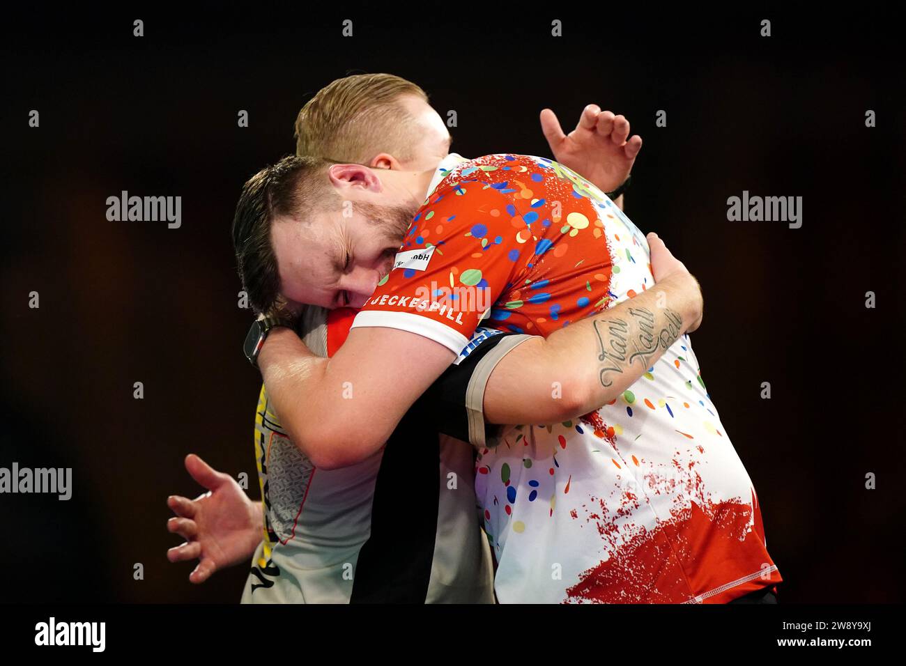 Florian Hempel reacts after winning his match against Dimitri Van den ...