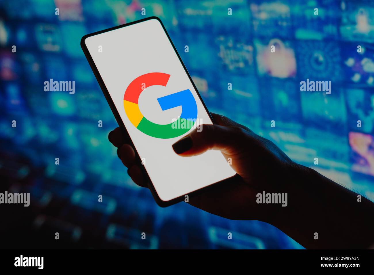 In this photo illustration, the Google logo is displayed on a ...