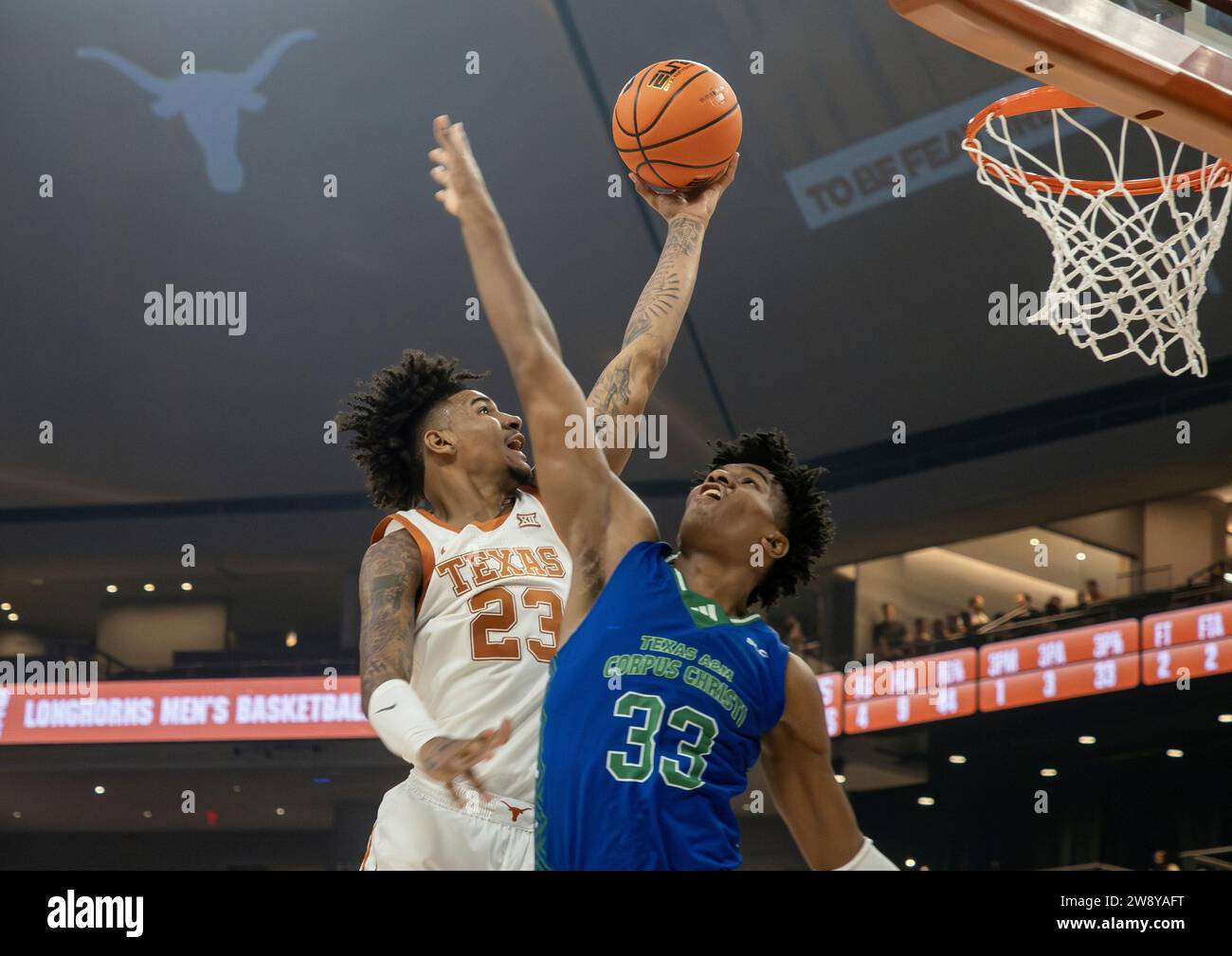 Texas forward Dillon Mitchell (23) goes up to shoot against Texas A&M ...