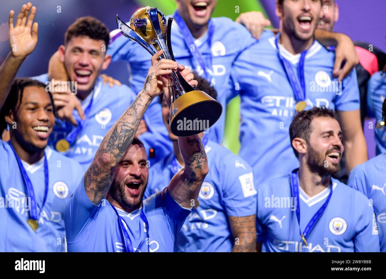 Manchester City's Kyle Walker lifts the trophy after they win the FIFA ...