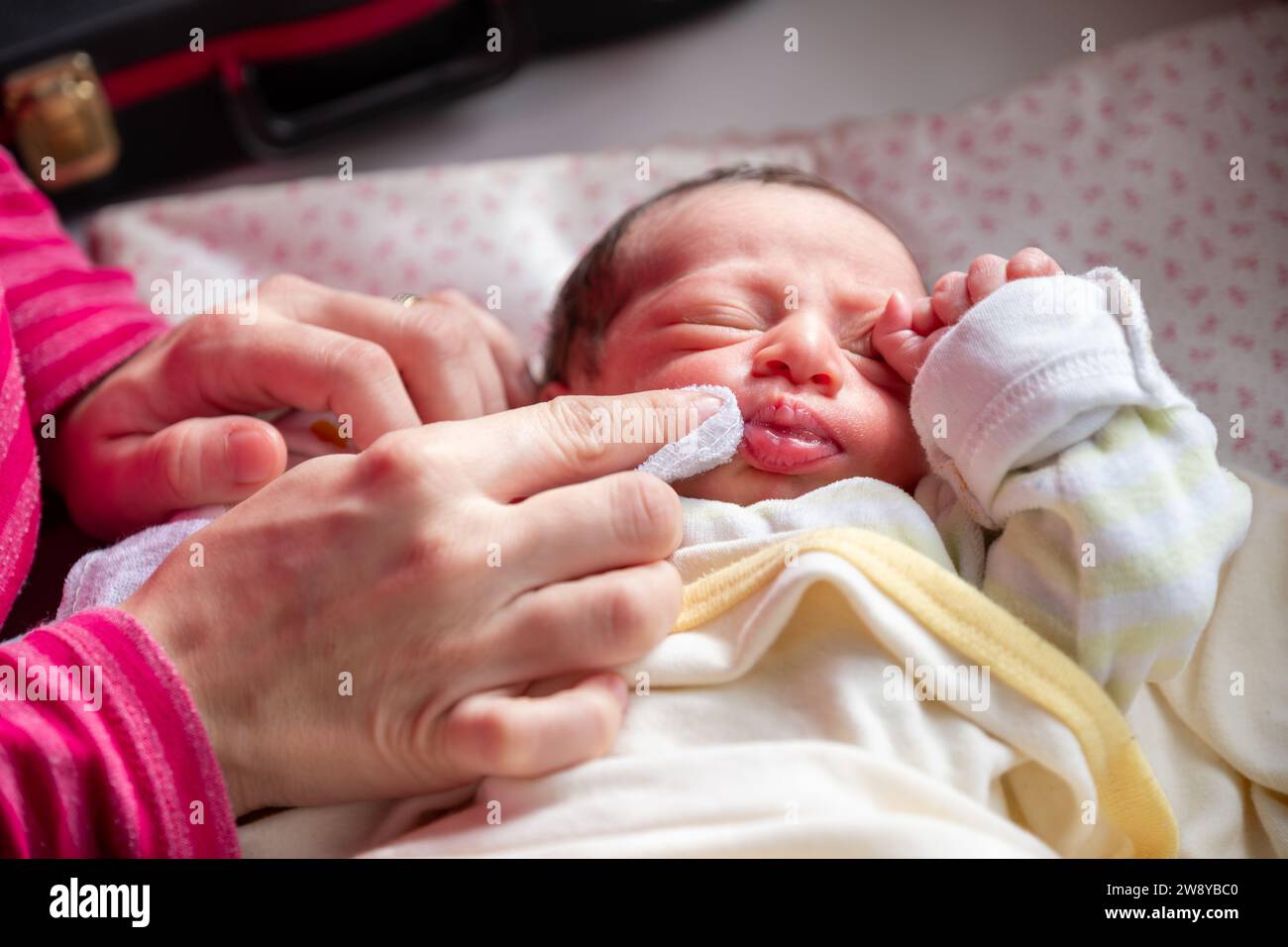 A new family member reactions with sun light and smile on his face ...