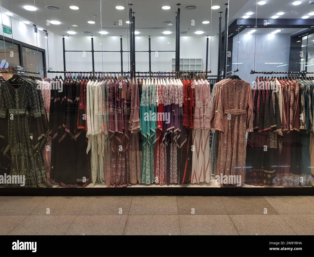 Clothing on hanger at the modern shop boutique Stock Photo - Alamy